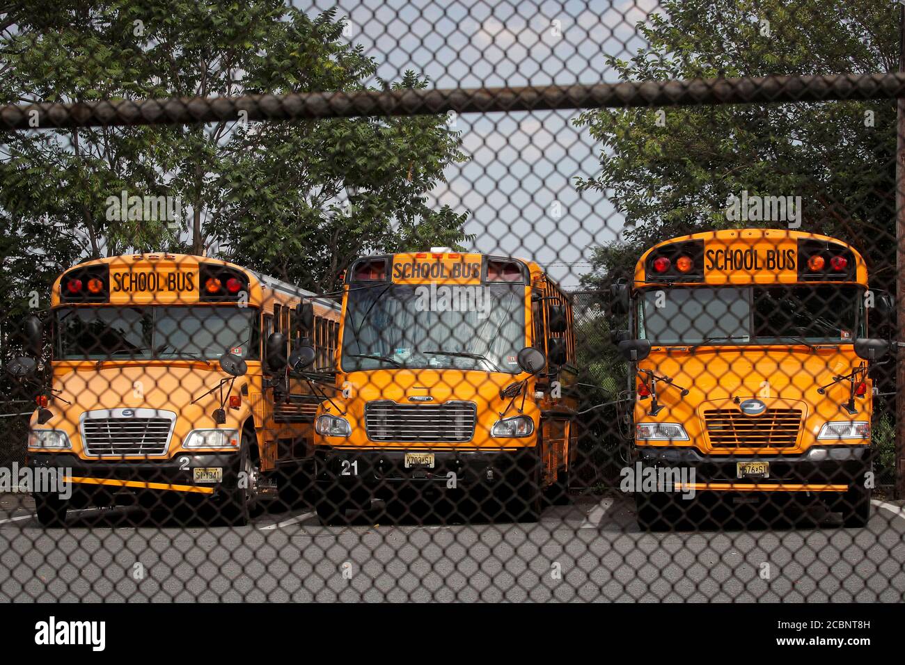 School buses depot hi-res stock photography and images - Alamy