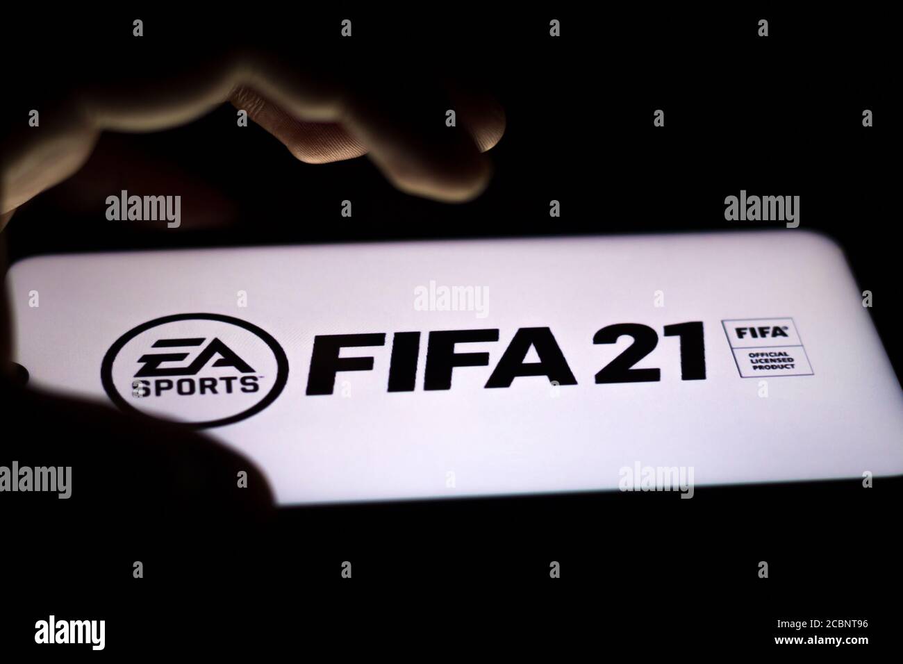 In this photo illustration the FIFA 21 logo is displayed on a ...