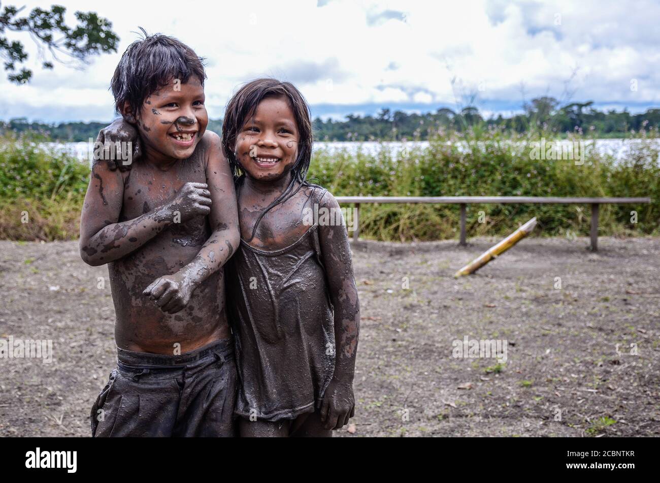 little kids playing in mud Stock Photo - Alamy