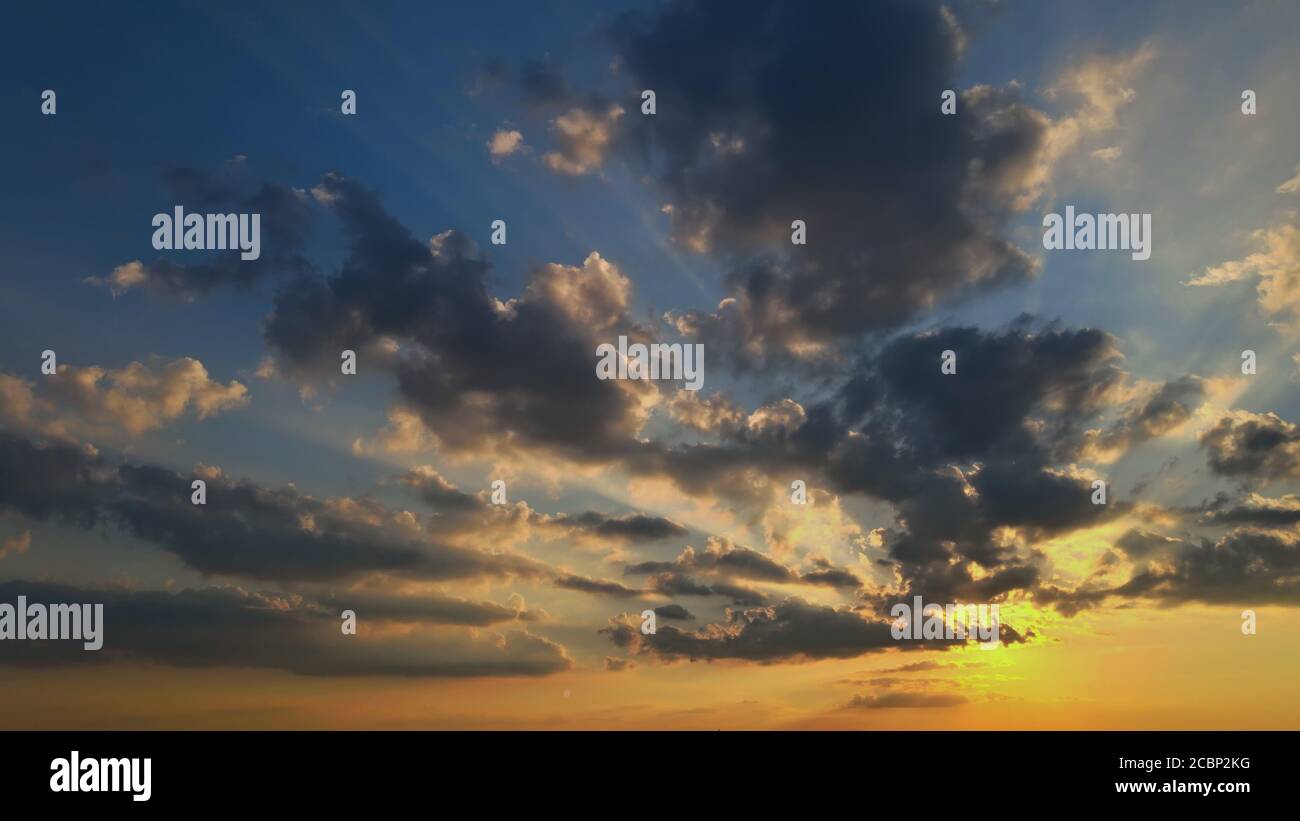 Colorful dramatic sunset sky bright horizon burning skies with clouds ...
