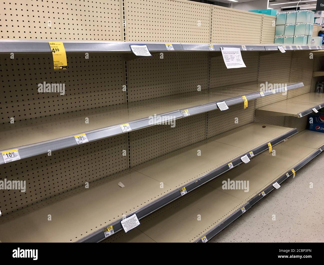 Seattle, USA – March 27, 2020: Late in the day empty Toilet Paper and Paper Towel aisle at ...