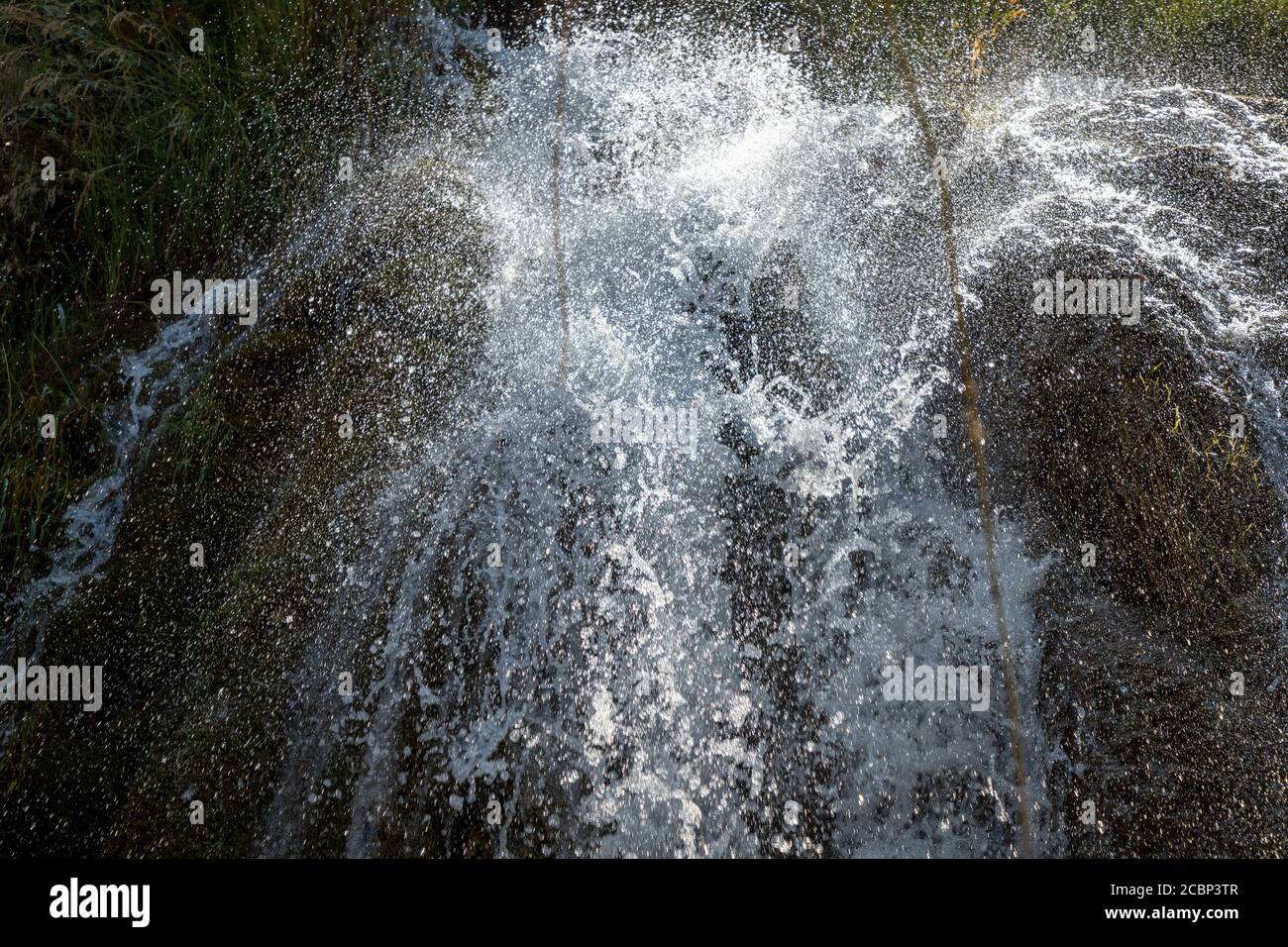 Water falling from the sky in drops like rain Stock Photo - Alamy