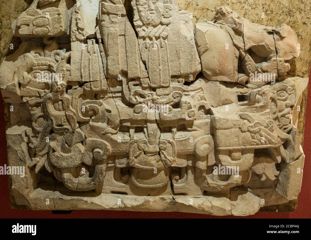 A carved stone monument in the museum at the ruins of the Mayan city of ...