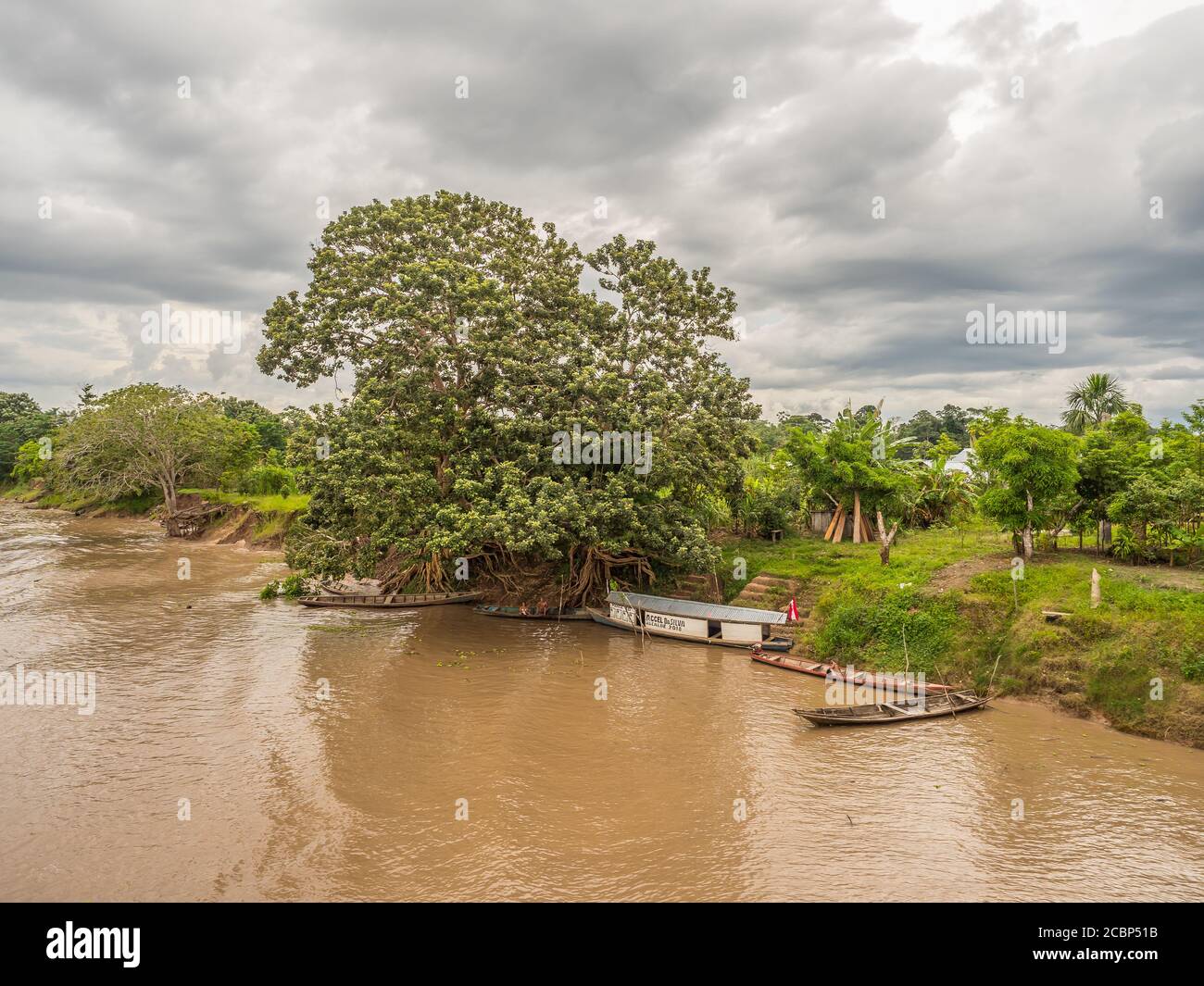 Amazon river, Peru - Mar 23, 2018: Small village on the bank of the ...