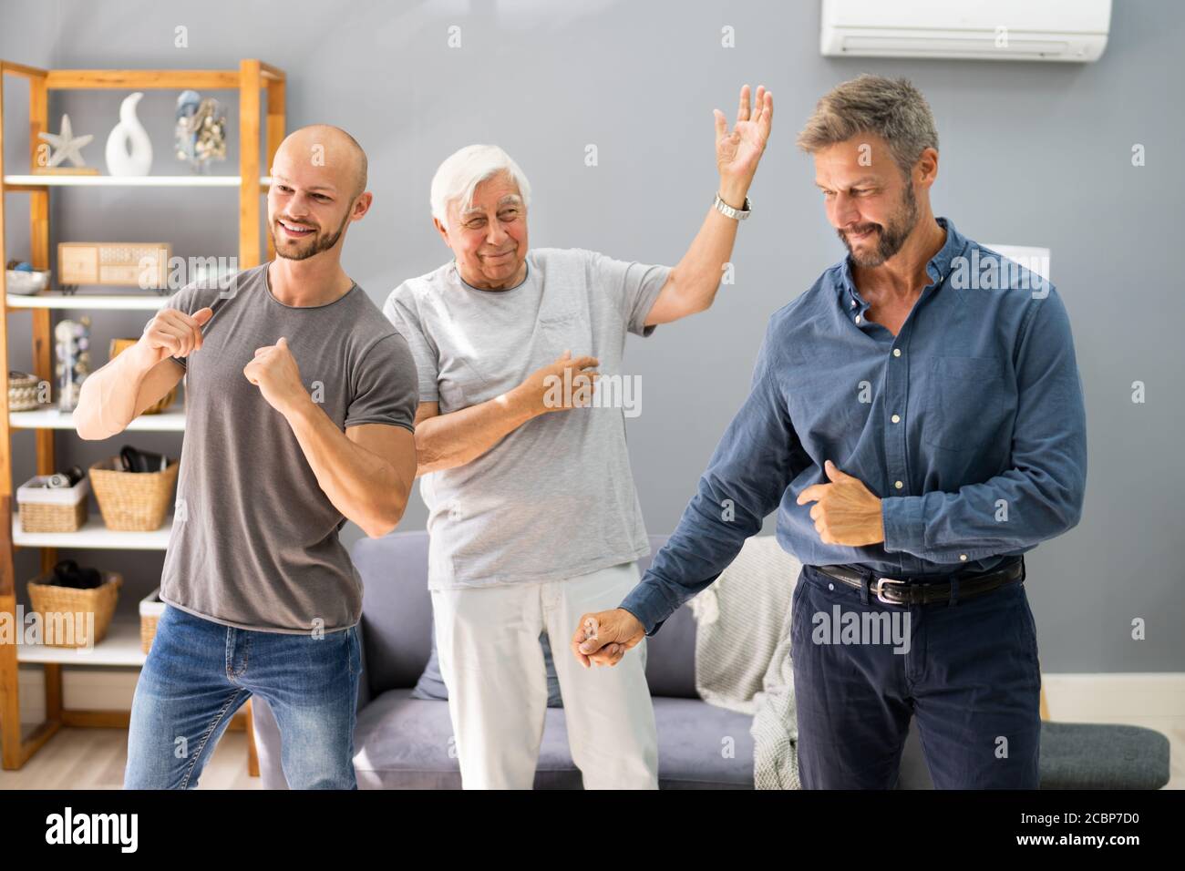 Three dancing men hi-res stock photography and images - Alamy