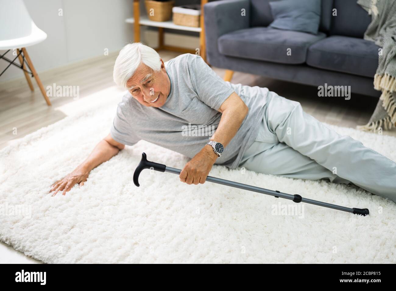 Elderly Senior Man Slip And Fall. Fallen Old Person Stock Photo - Alamy