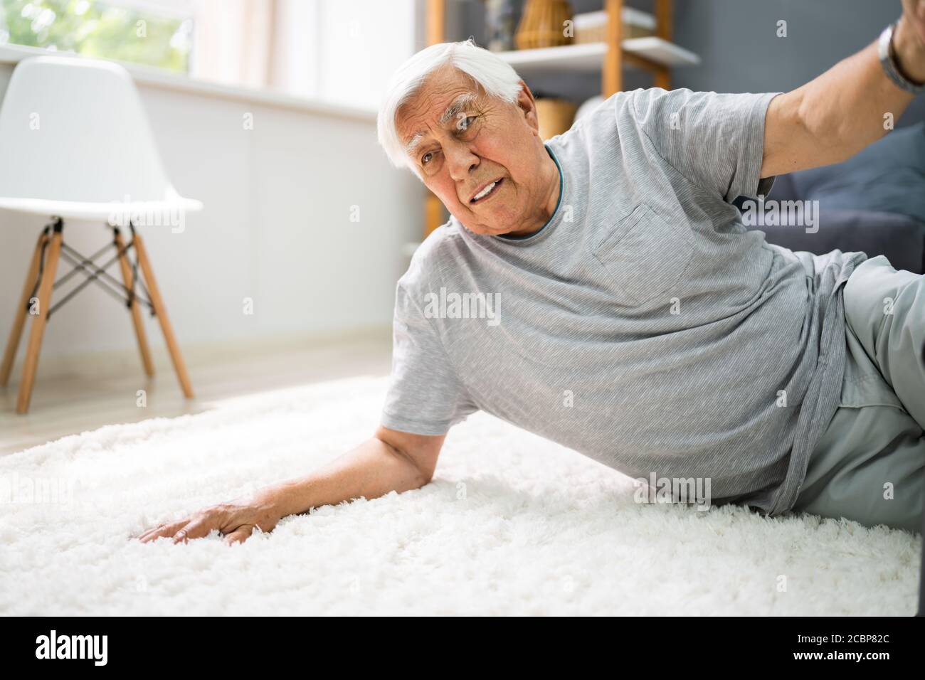 Elderly Senior Man Slip And Fall. Fallen Old Person Stock Photo - Alamy
