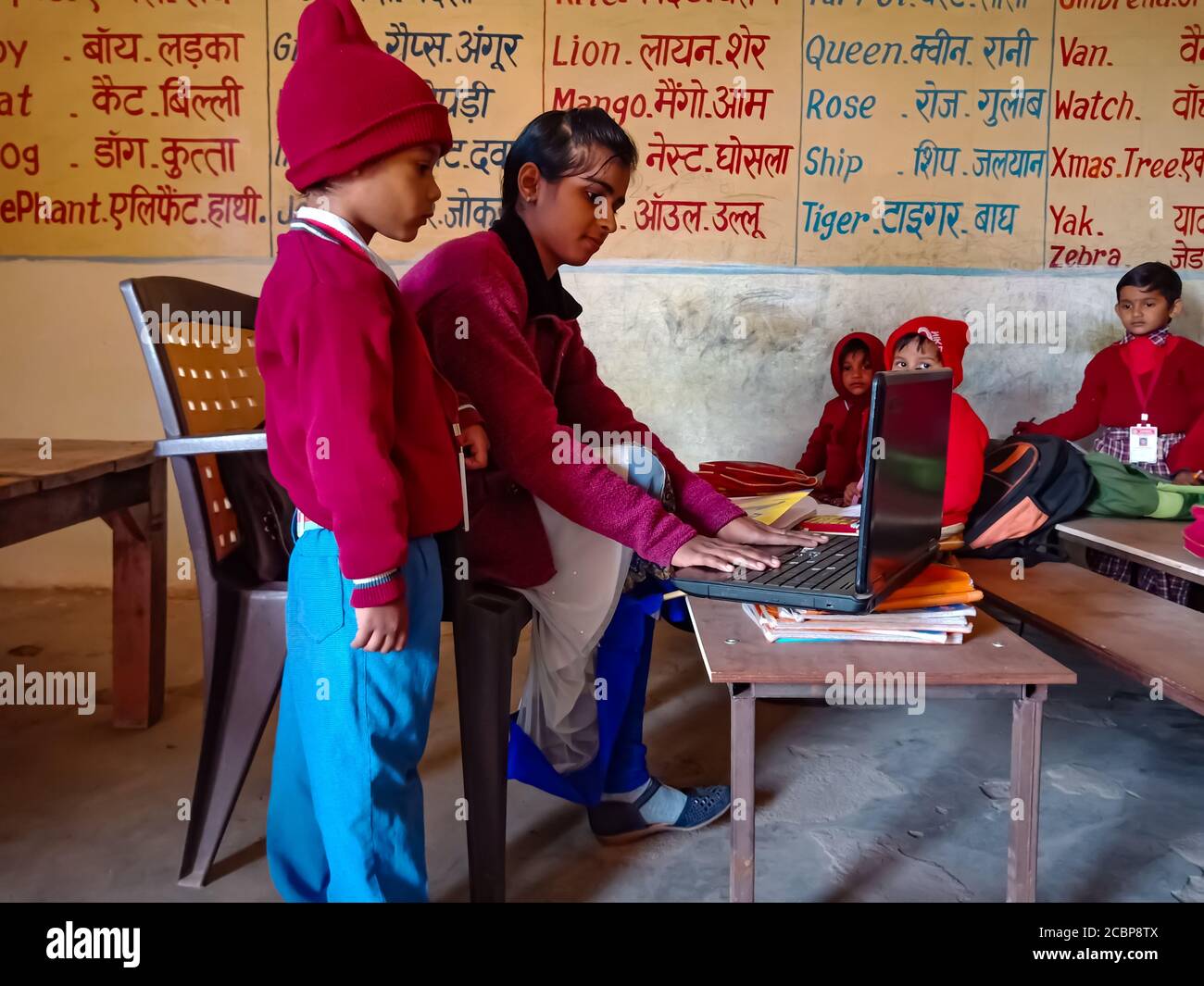 Studying villagers hi-res stock photography and images - Alamy