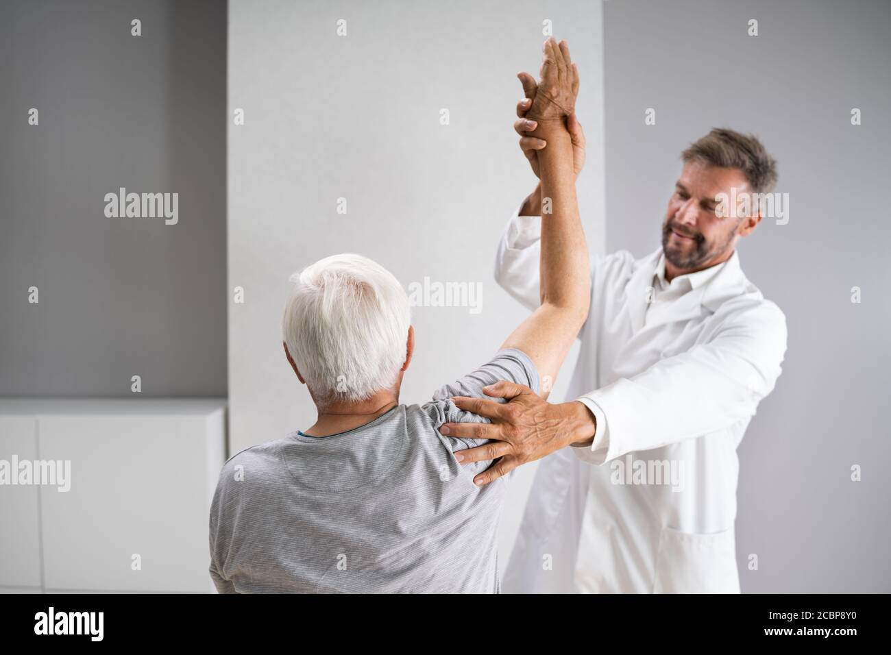 Physical Rehabilitation Therapy Exercise After Shoulder Injury Stock ...