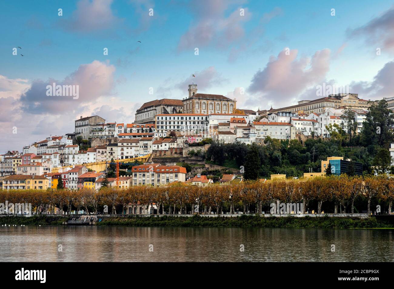 Coimbra cityscape with Mondego river by sunset, Portugal Stock Photo ...