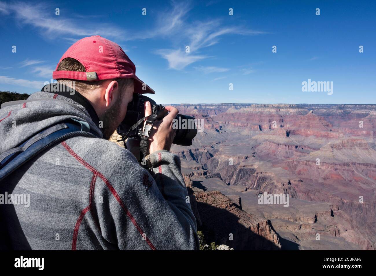 Tourist photographed in Grand Canyon, canyon landscape, eroded rock ...