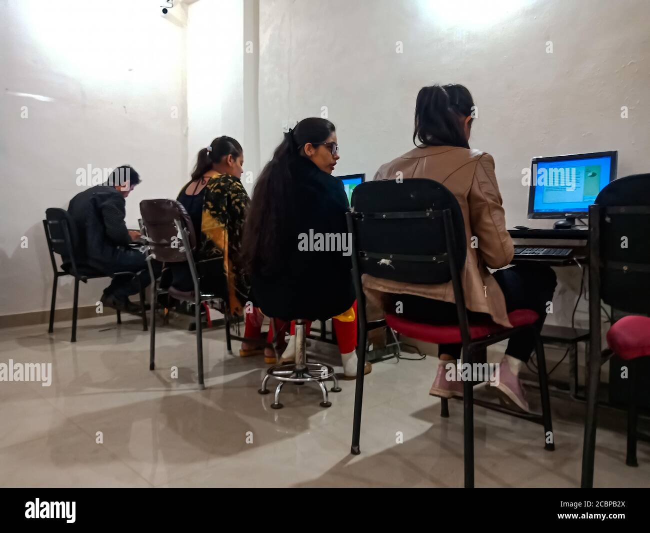 Indian girl studying on laptop desk hi-res stock photography and images ...