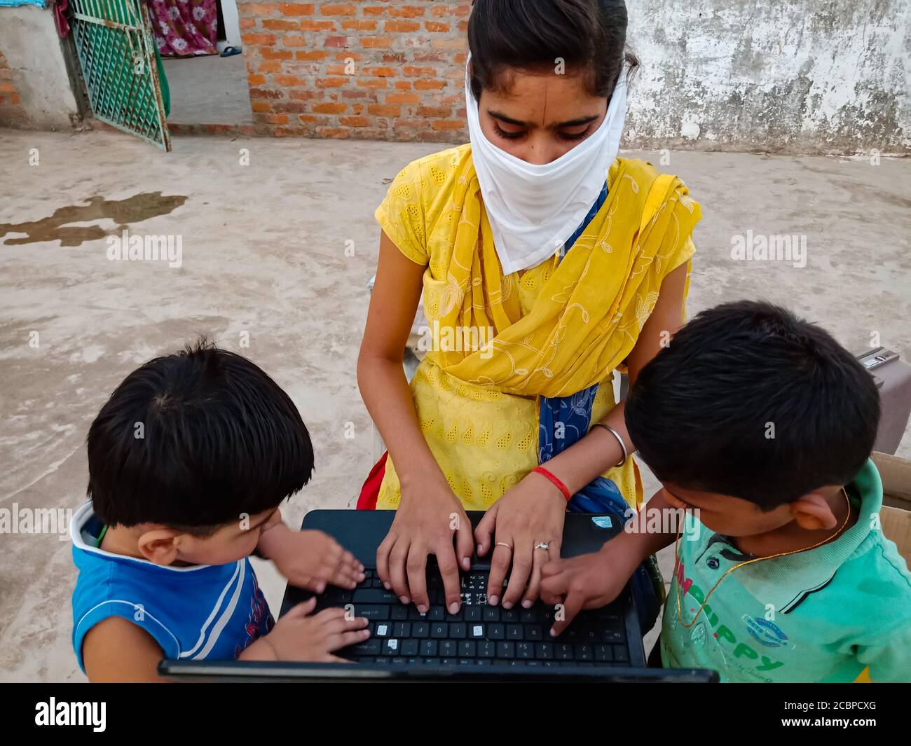 DISTRICT KATNI, INDIA - MAY 23, 2020: An indian girl giving training ...