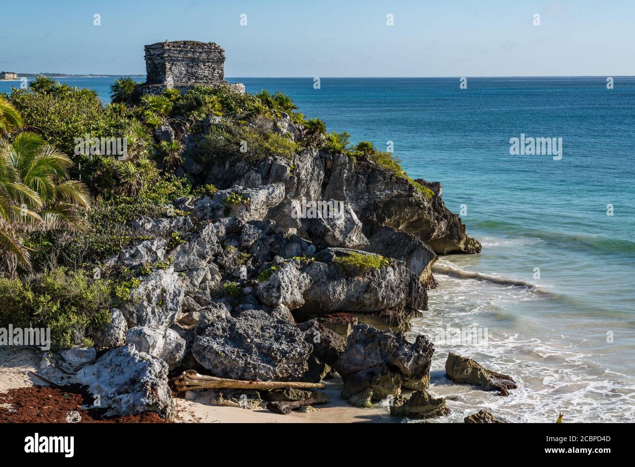 The Temple of the Wind God in the ruins of the Mayan city of Tulum on ...