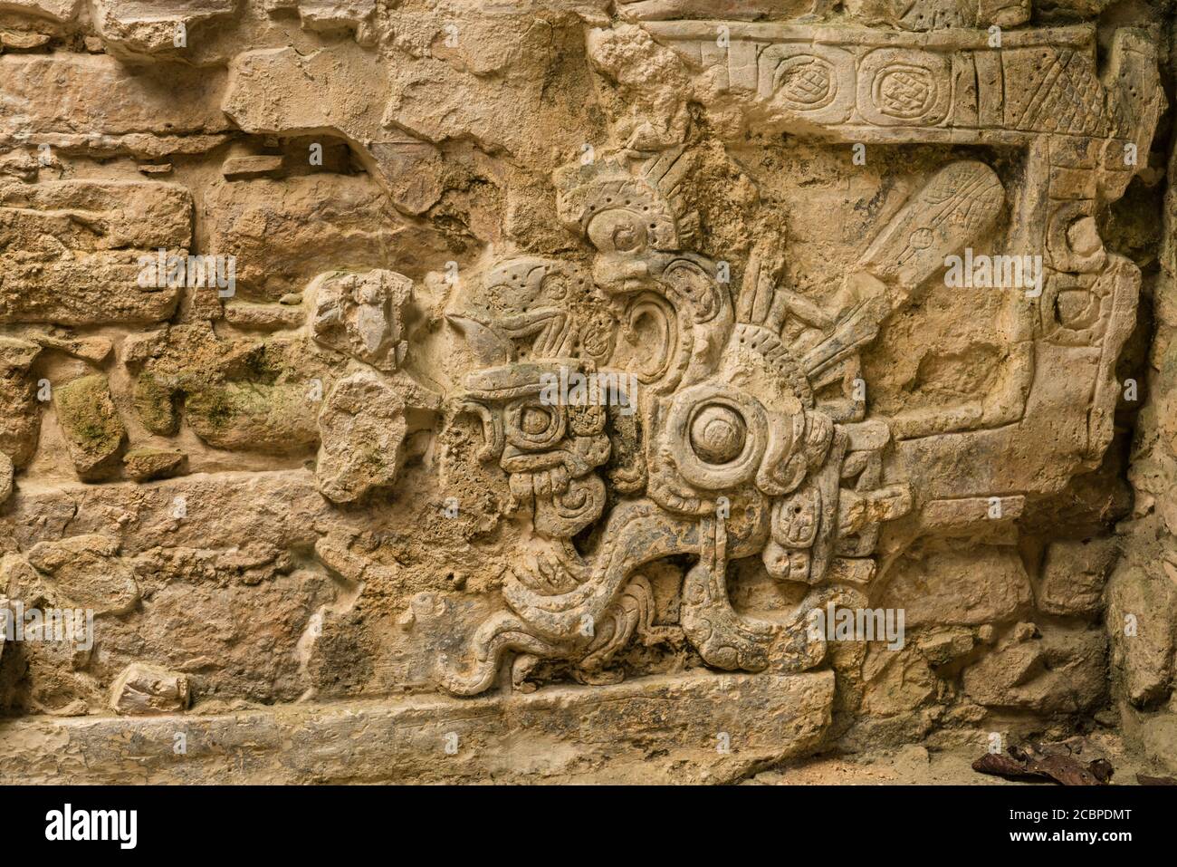 Stucco figures on the back wall of Building 21 in the ruins of the ...