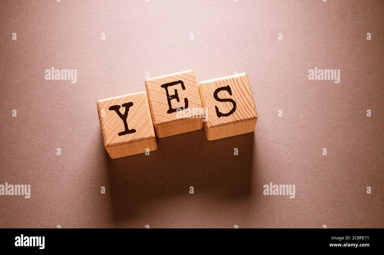 Word yes written on red hi-res stock photography and images - Alamy