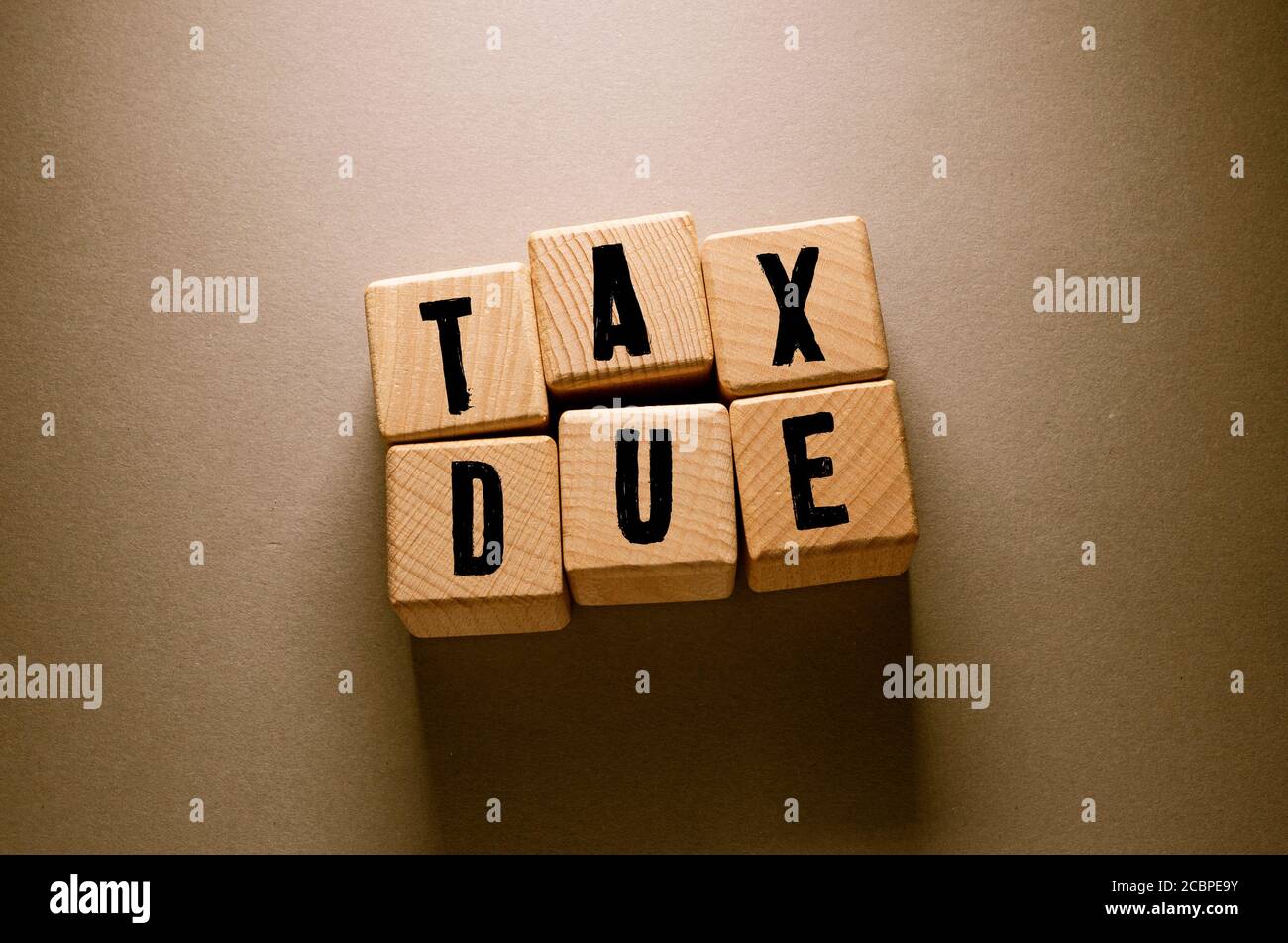 Tax Due Word Written on Wooden Cubes Stock Photo - Alamy