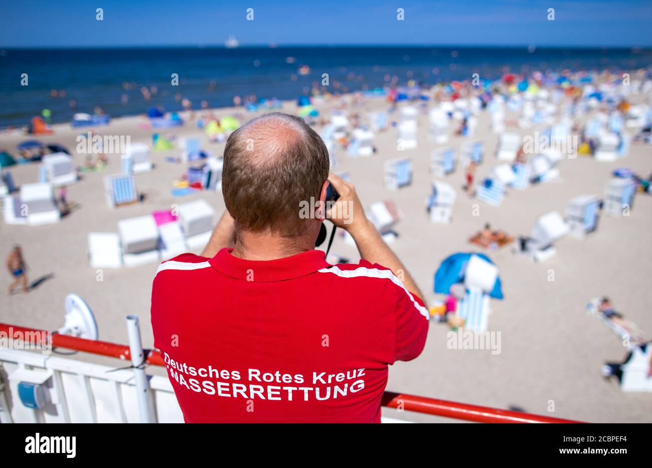 Rostock, Germany. 12th Aug, 2020. The watch leader Lukas Knaup observes ...
