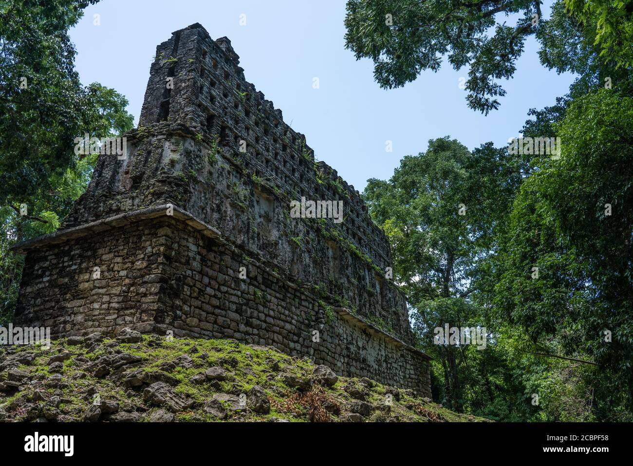 The roof comb of Temple 33 in the ruins of the Mayan city of Yaxchilan ...