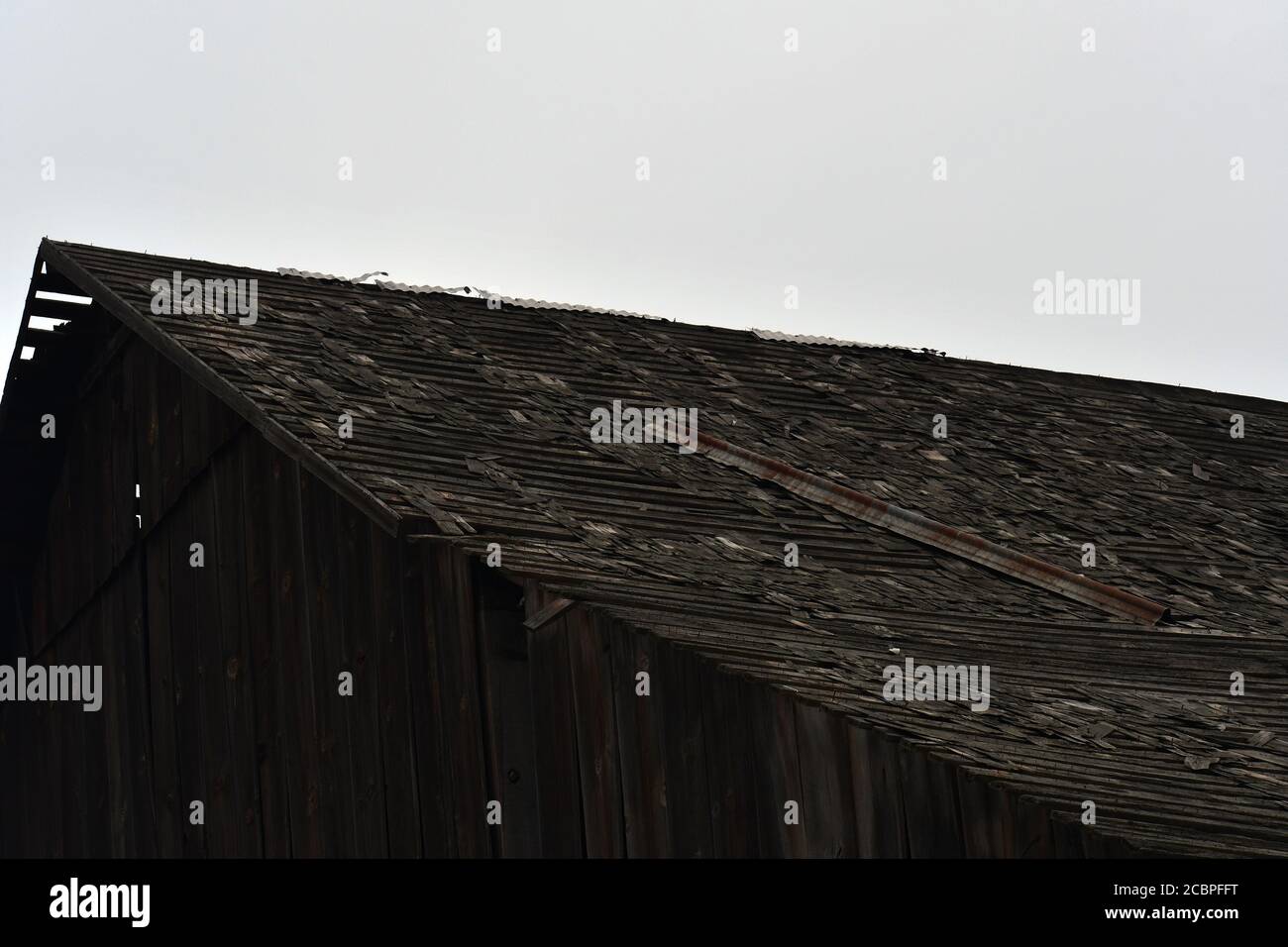 Low angle shot of a roof of an old barn in the farm Stock Photo - Alamy
