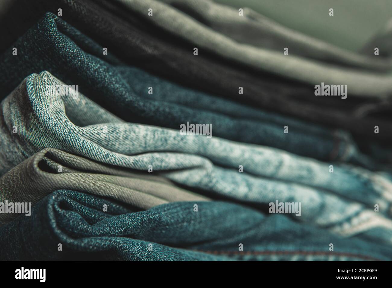 Neatly folded denim jeans hi-res stock photography and images - Alamy