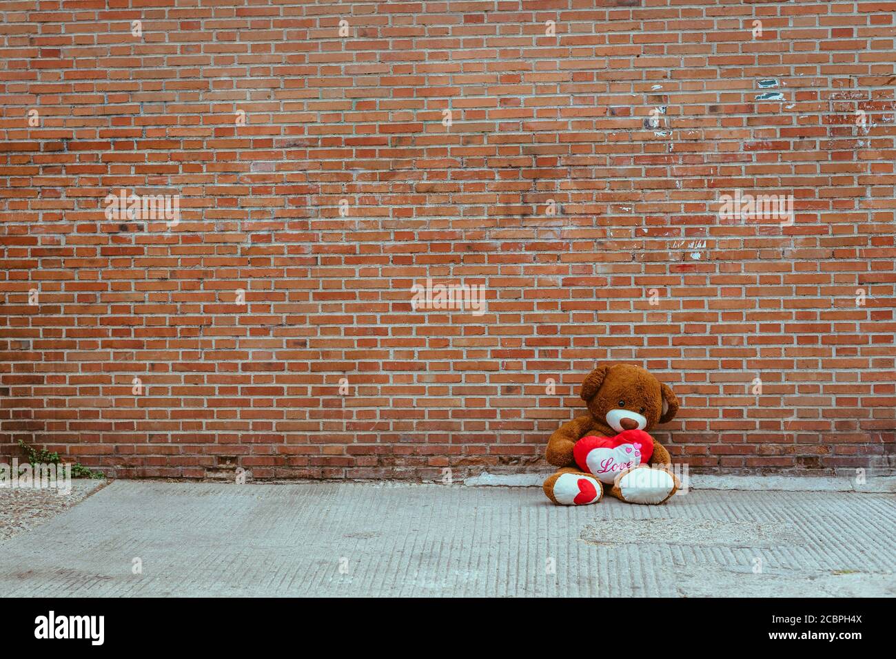 Sad toy brick hi-res stock photography and images - Alamy