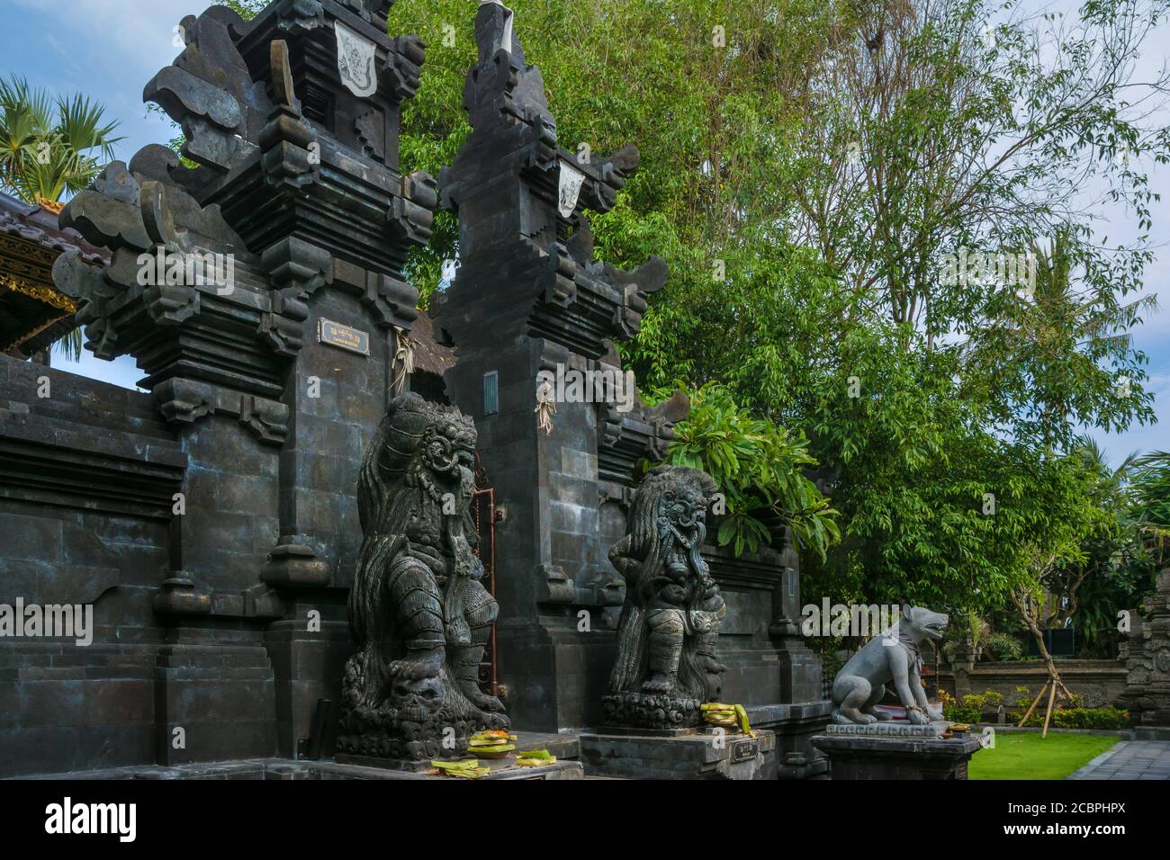 Statues at the entrance of a hinduist temple in Bali, Indonesia Stock ...