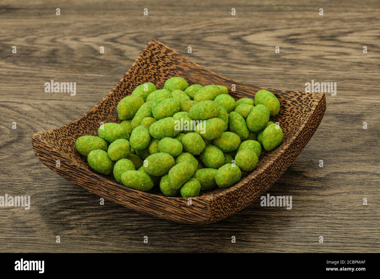 Spicy wasabi peanuts snack in the bowl Stock Photo - Alamy