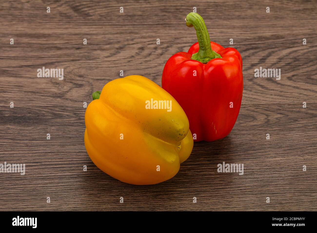 Two Ripe sweet Bulgarian bell peppers Stock Photo - Alamy