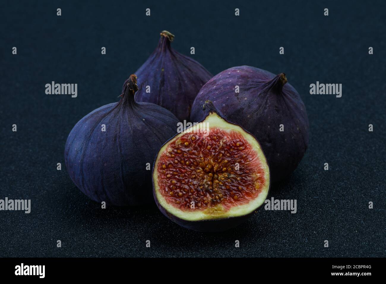 Ripe sweet fresh sliced fig fruit Stock Photo - Alamy