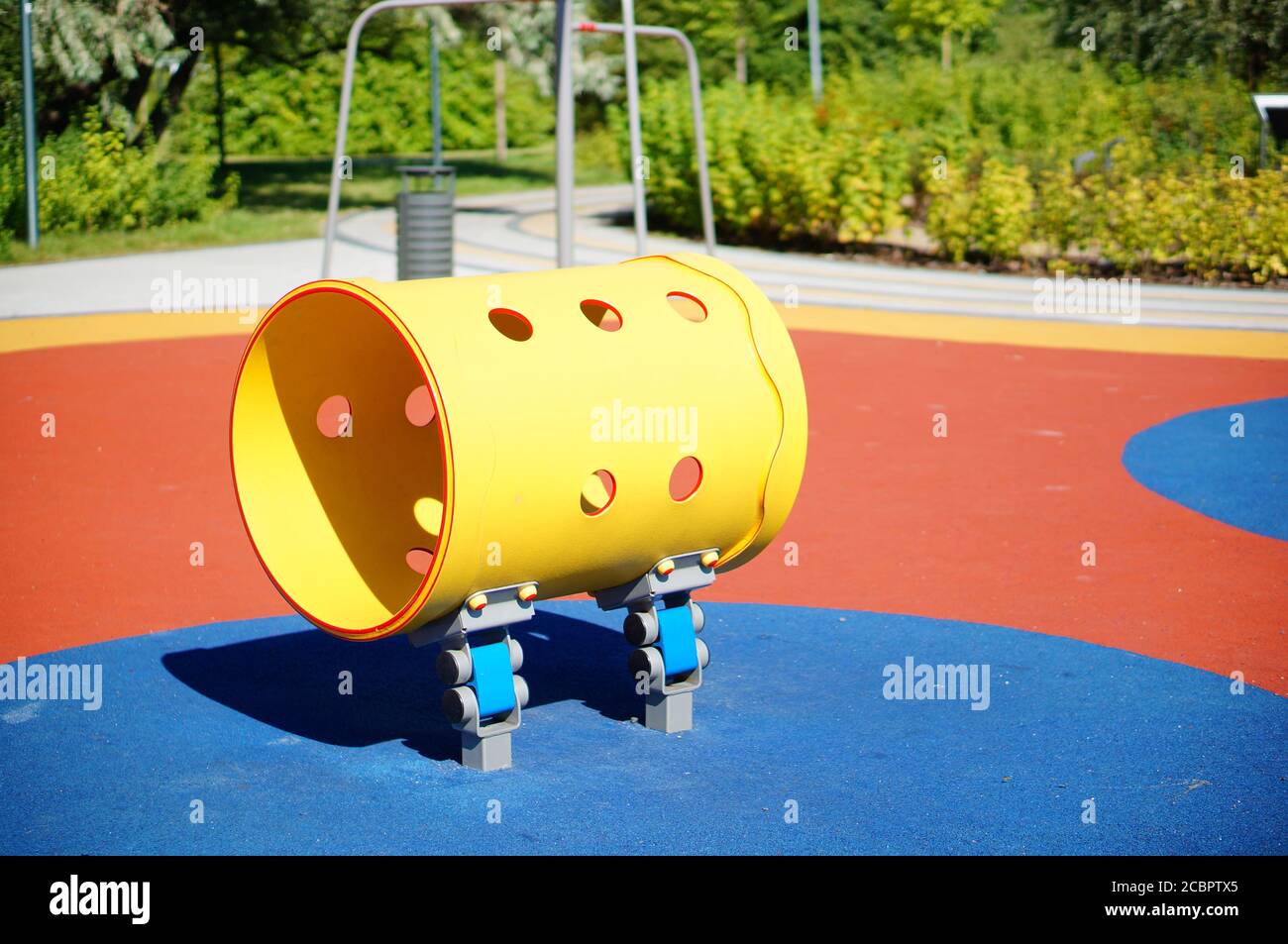 Nice playground with colorful attractions on a sunny day Stock Photo ...