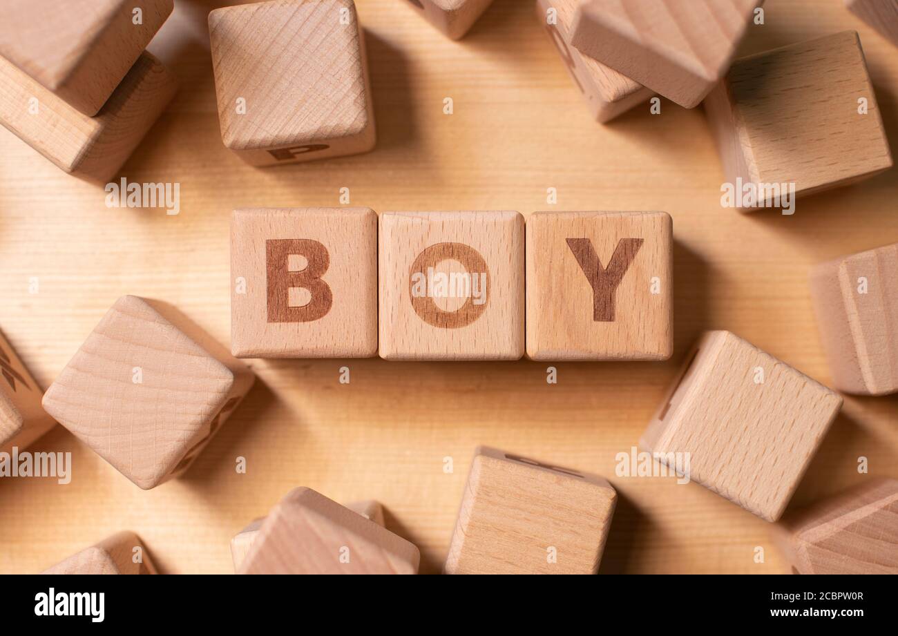 Word boy written with wooden cubes Stock Photo - Alamy