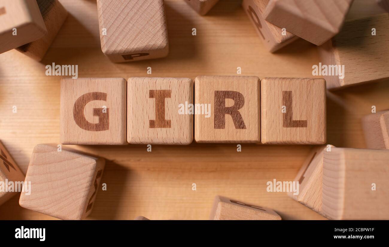 Word Girl written with wooden cubes Stock Photo - Alamy