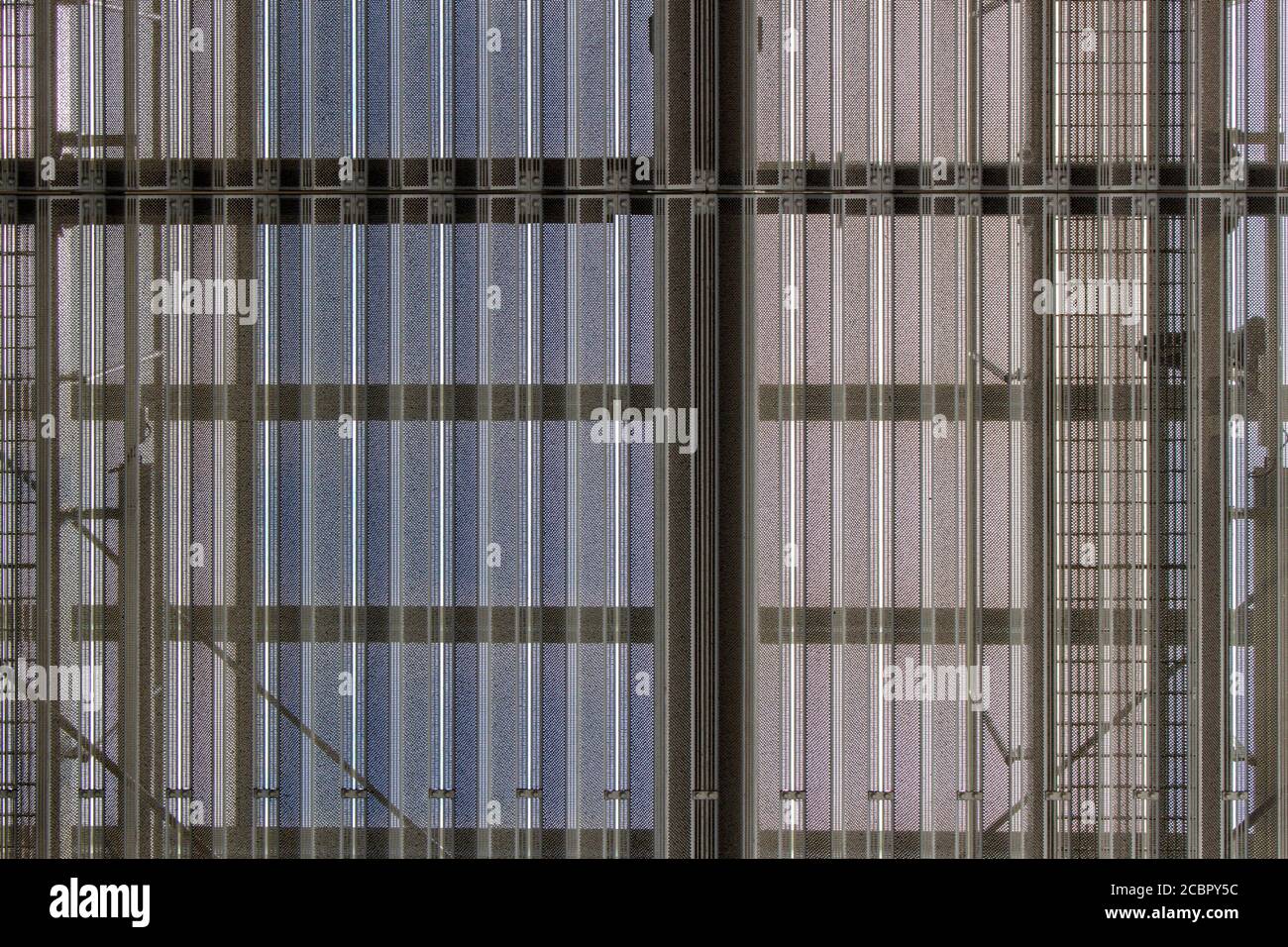 Wall design with metal grid plates Stock Photo - Alamy