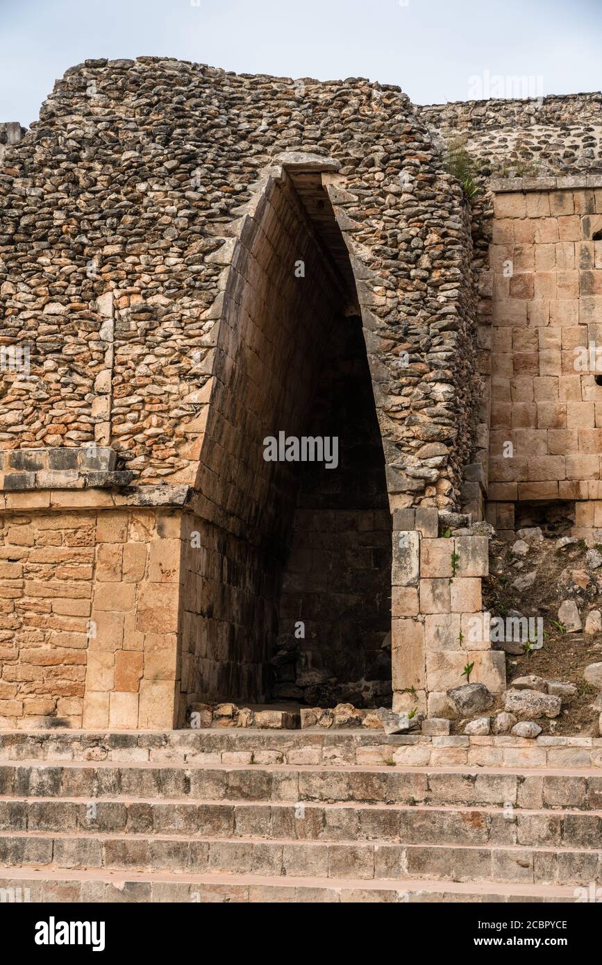 A corbel arch doorway in the ruins of the Mayan city of Uxmal in ...