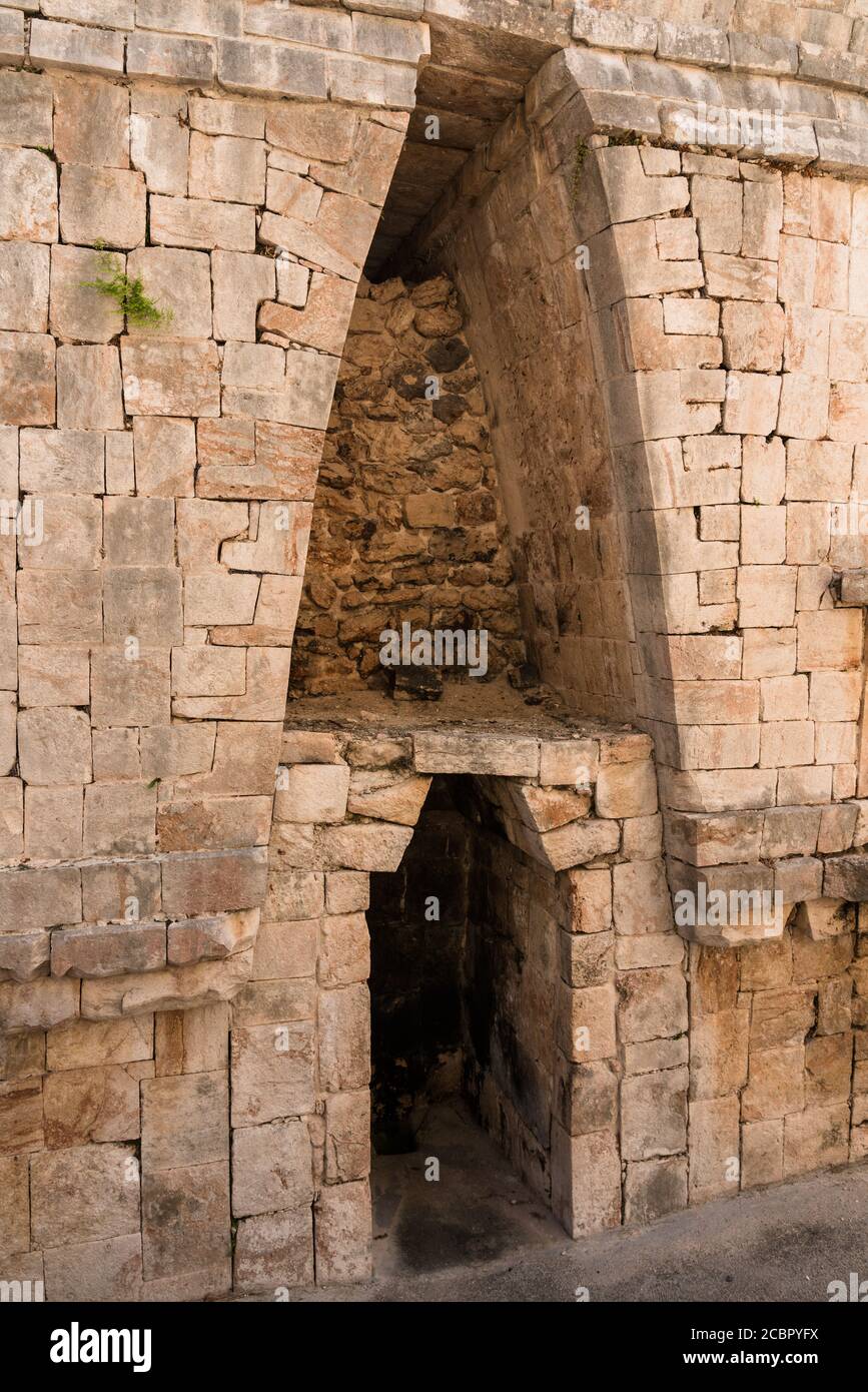 A corbel arch doorway in the ruins of the Mayan city of Uxmal in ...