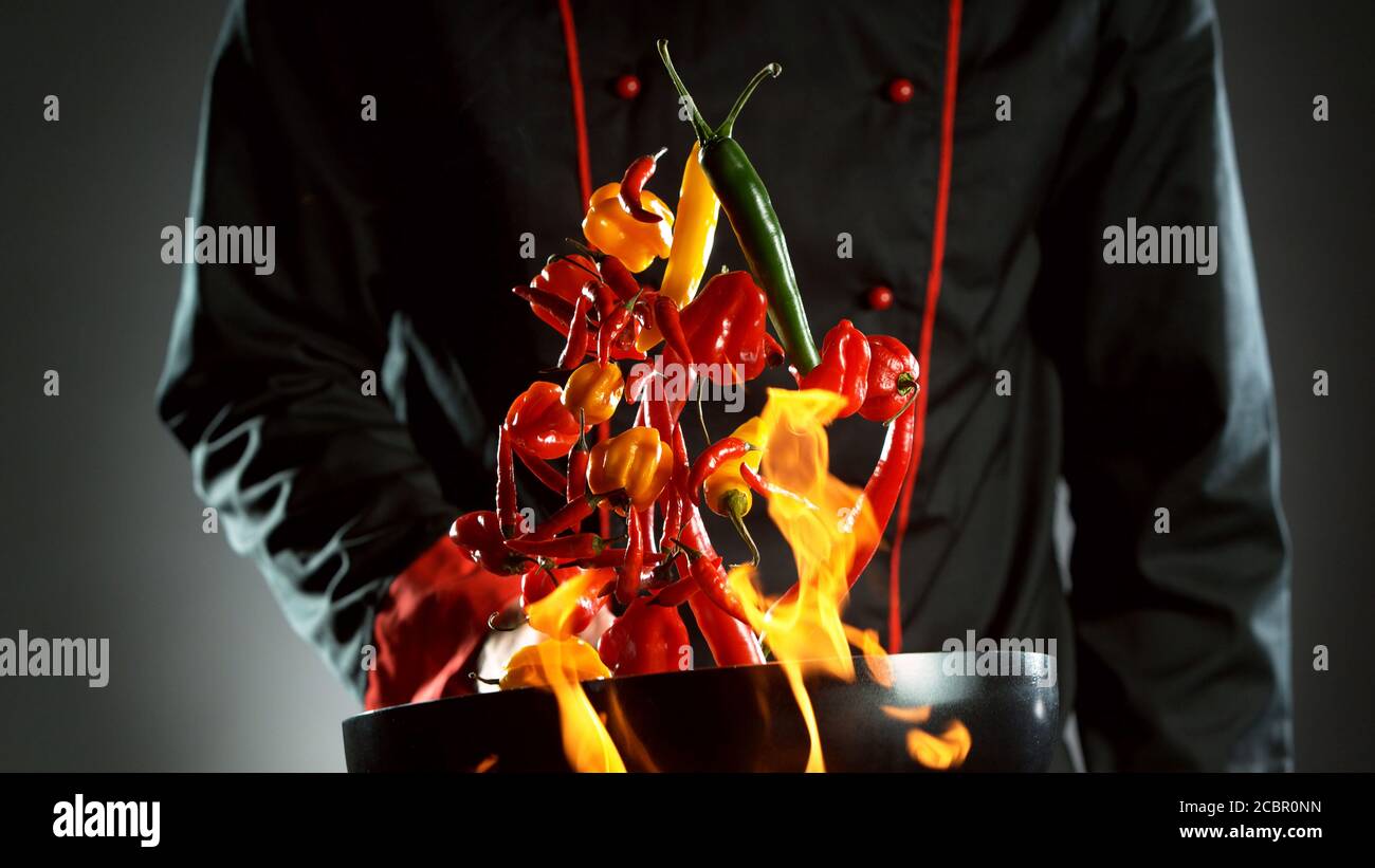 Man eating chilli hi-res stock photography and images - Alamy