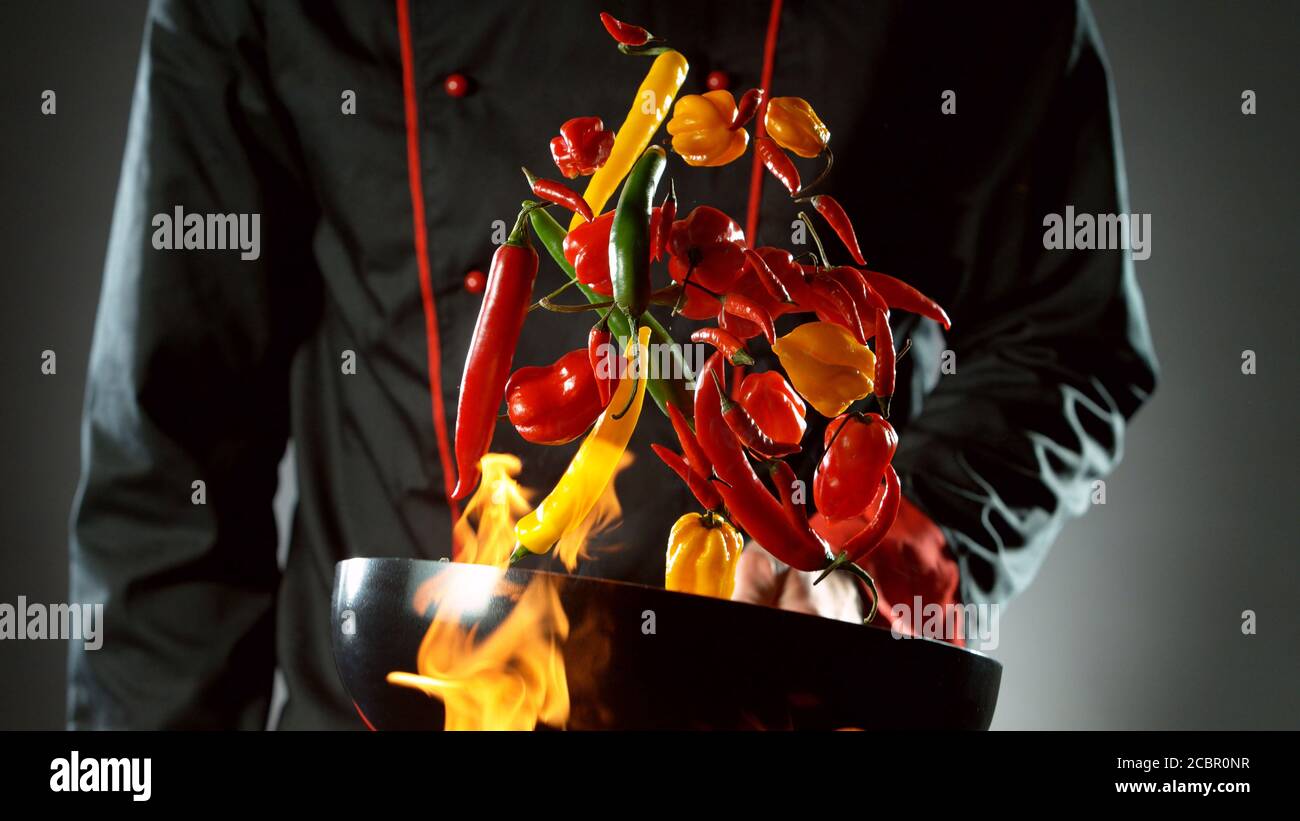Man eating chilli hi-res stock photography and images - Alamy