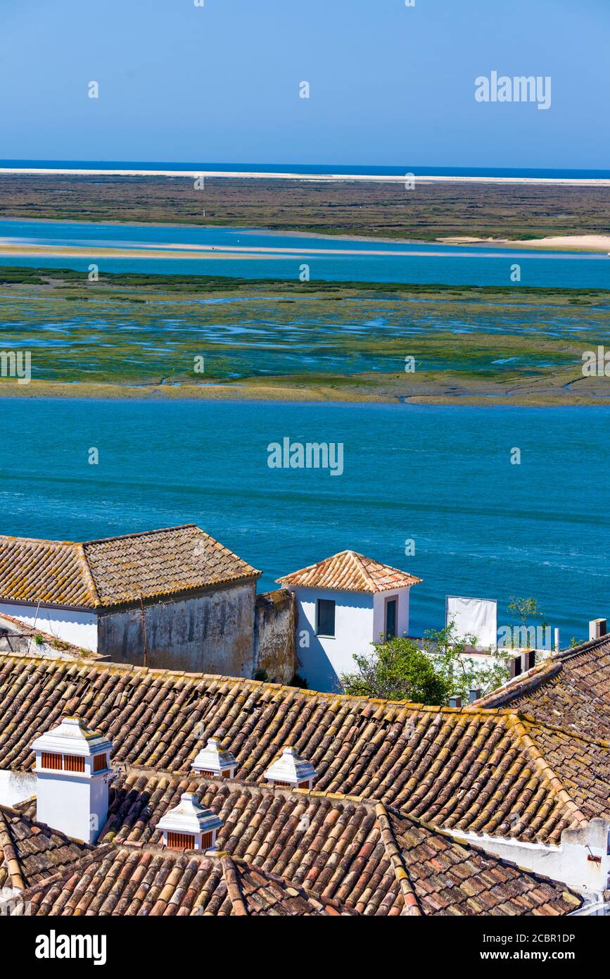 tiled roof and lagoon Ria Formosa in Faro, Algarve, Portugal Stock ...