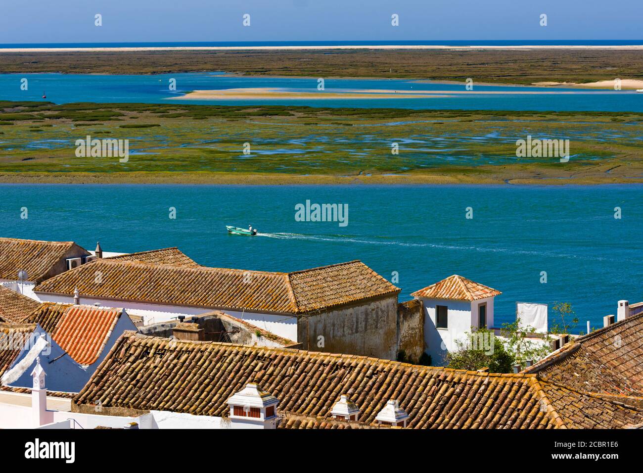 tiled roof and lagoon Ria Formosa in Faro, Algarve, Portugal Stock ...