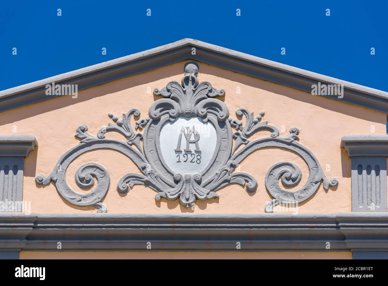 sculpture of a coat of arms on a facade of the old town of Faro ...