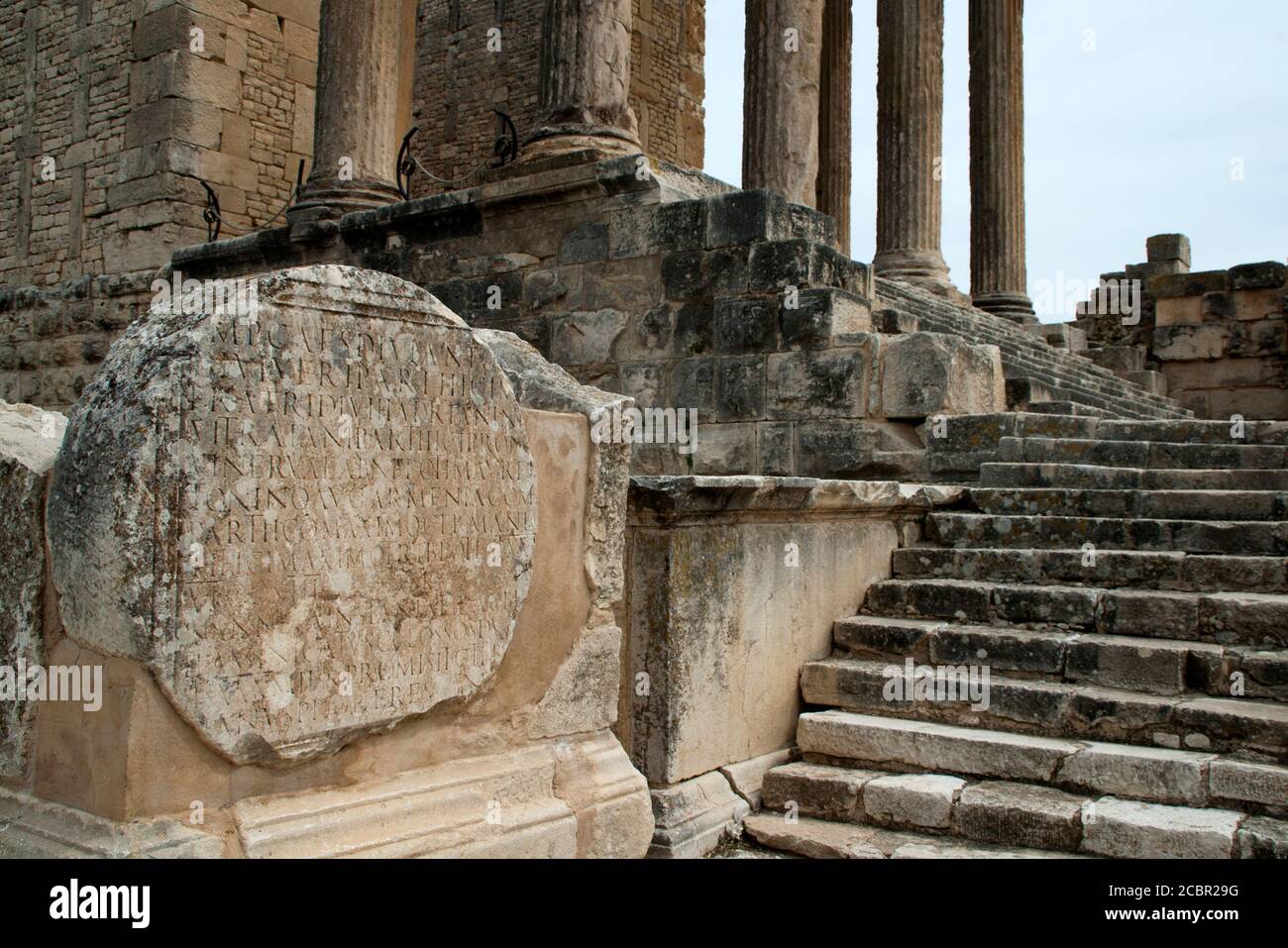 Thugga Tunisia, stone with inscription and stairs in front of The ...