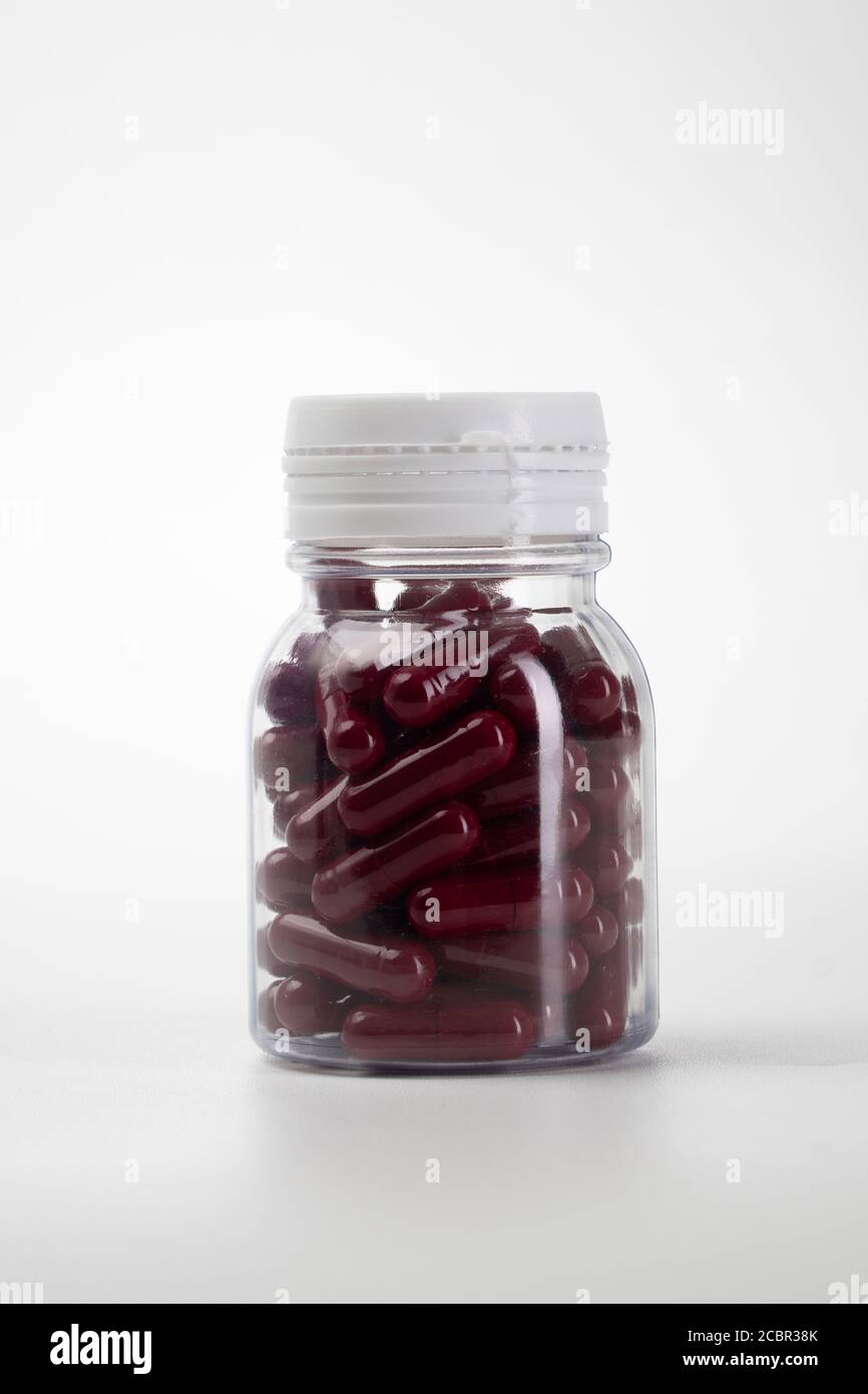 caplets medicine bottle isolated on white background Stock Photo - Alamy