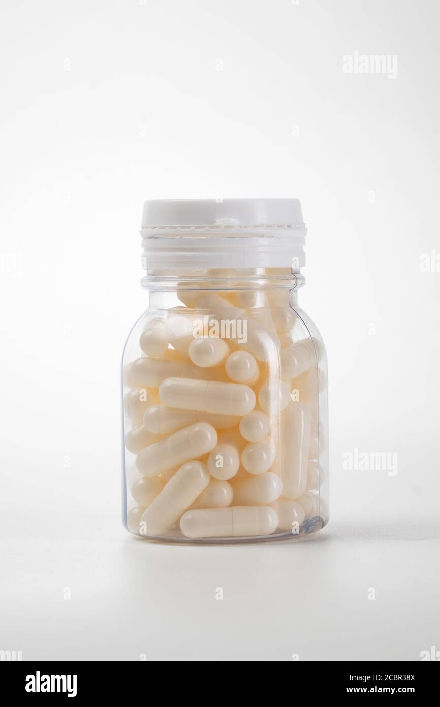 caplets medicine bottle isolated on white background Stock Photo - Alamy