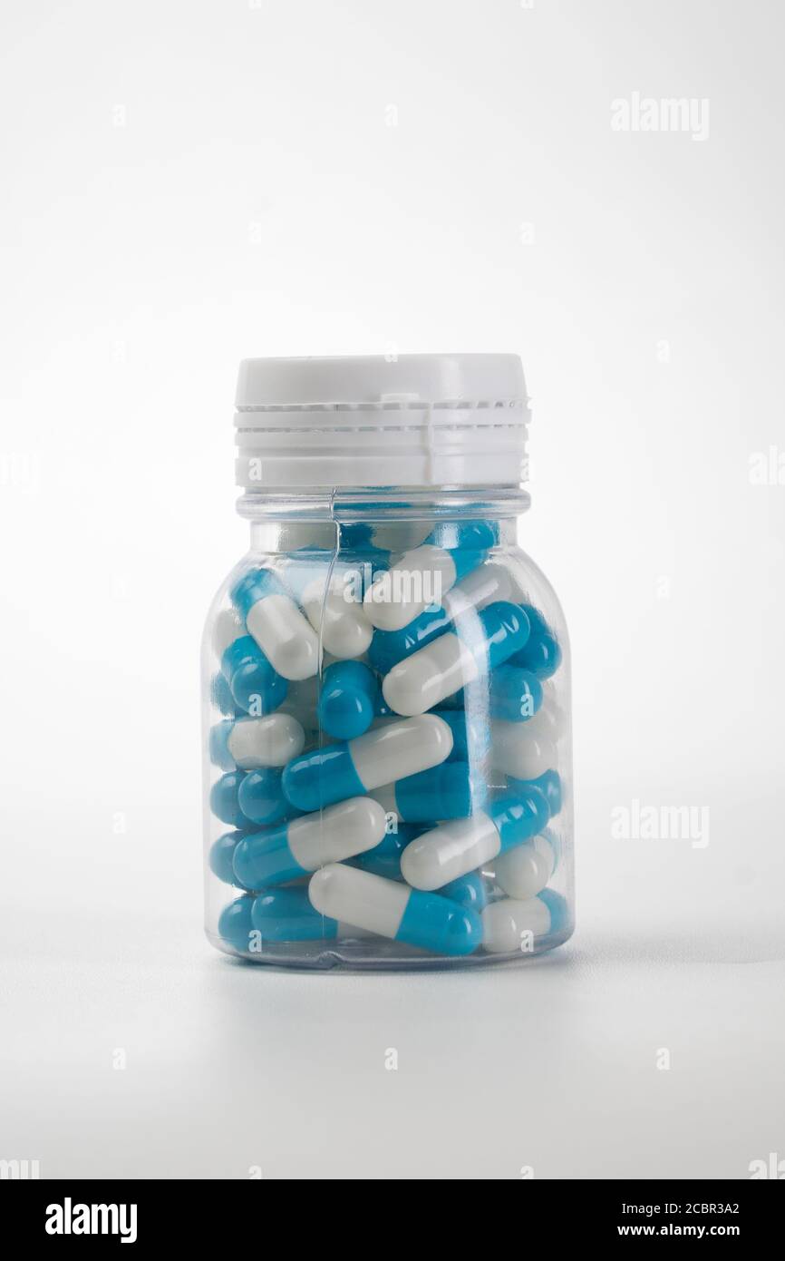 caplets medicine bottle isolated on white background Stock Photo - Alamy