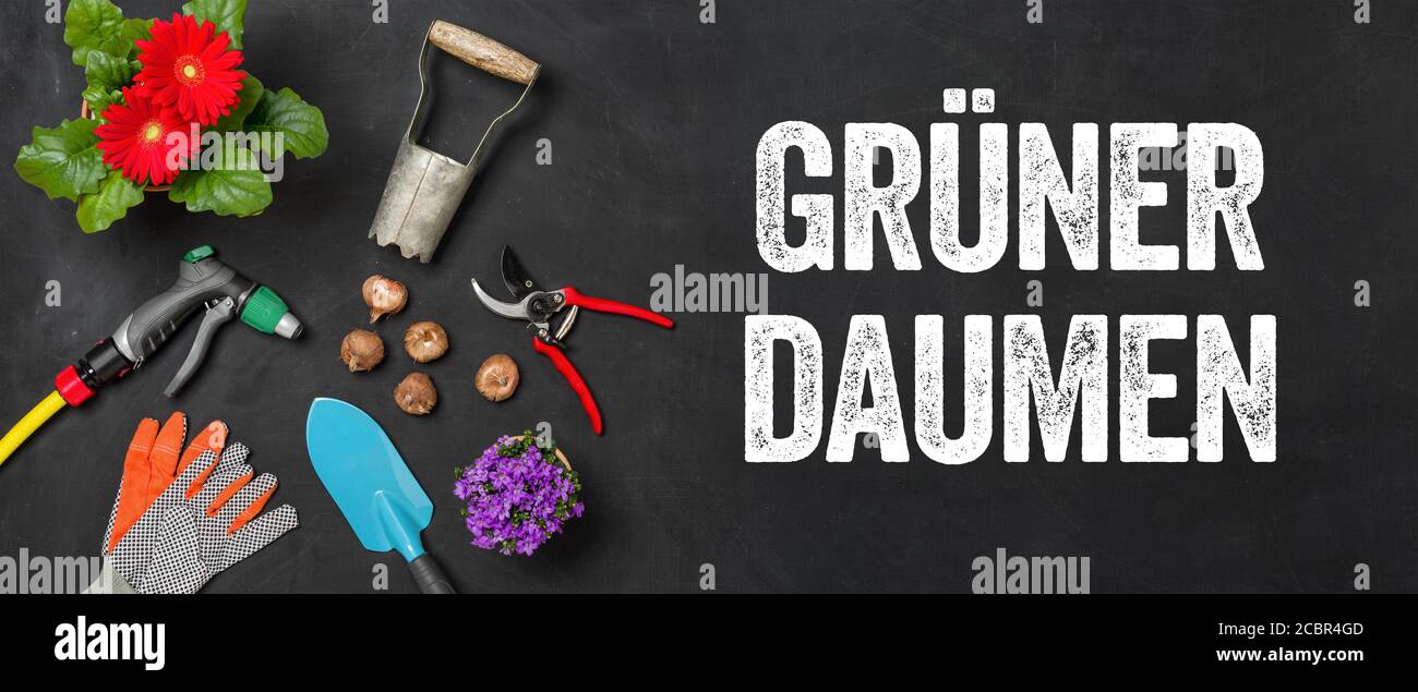 Garden tools on a dark background - Green thumb - Gruener Daumen ...