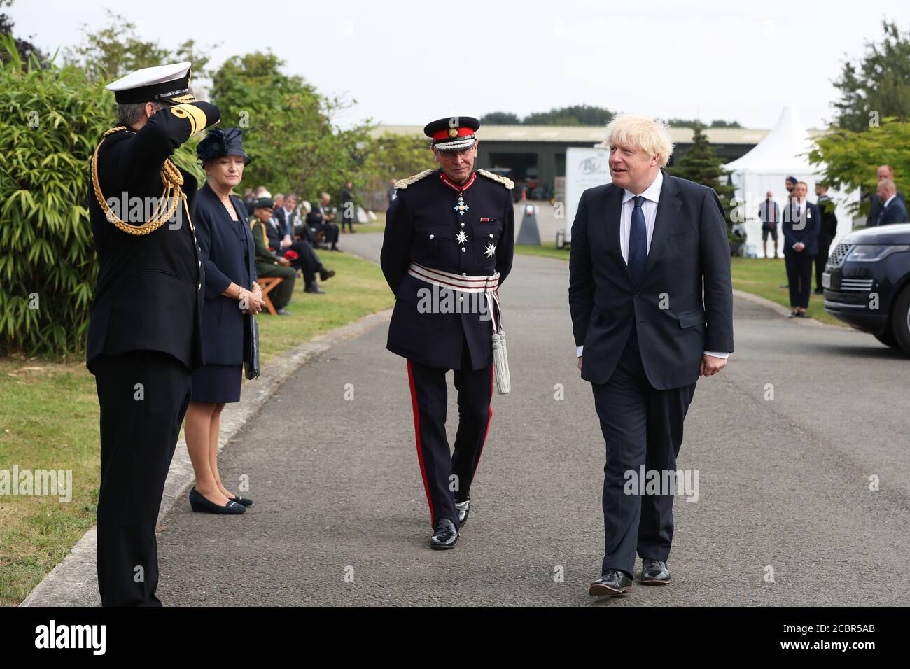 Prime Minister Boris Johnson arrives to attend the national service of ...