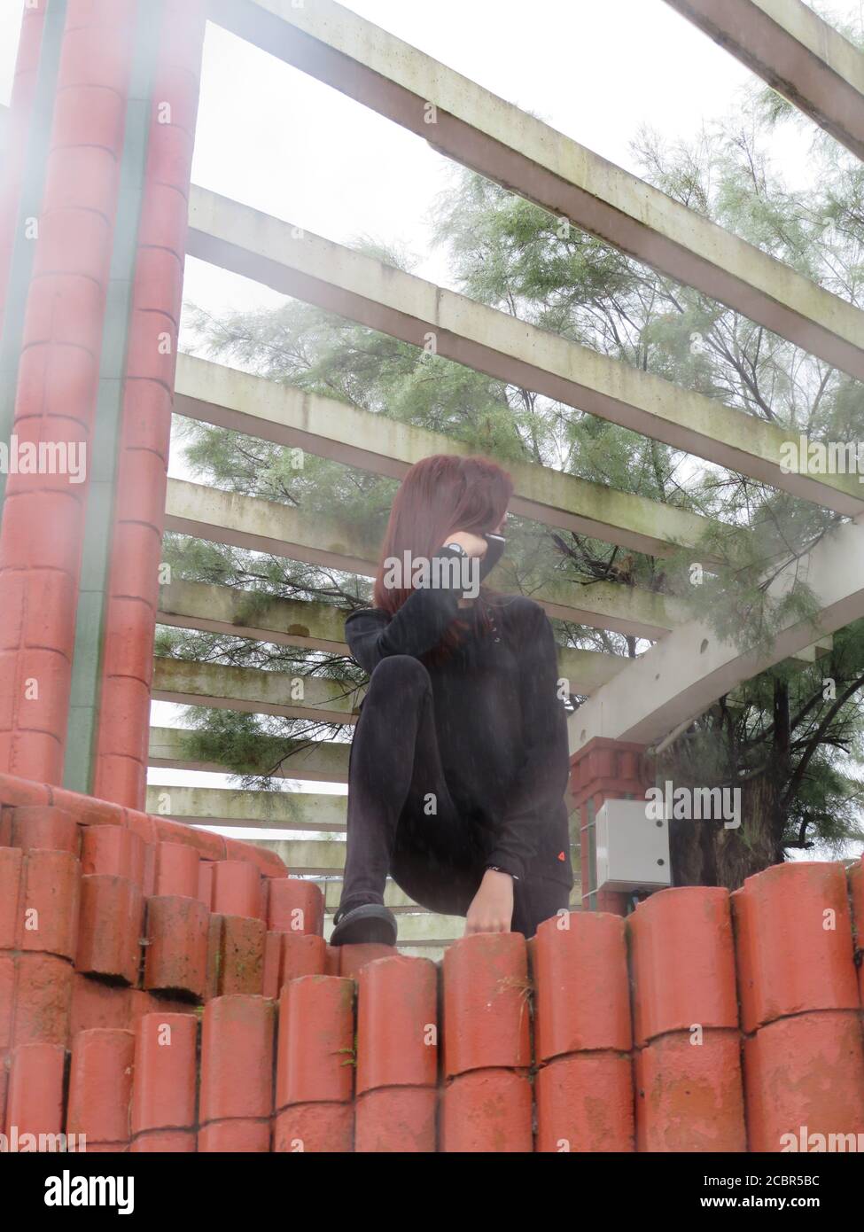 A girl in a bridge Stock Photo - Alamy