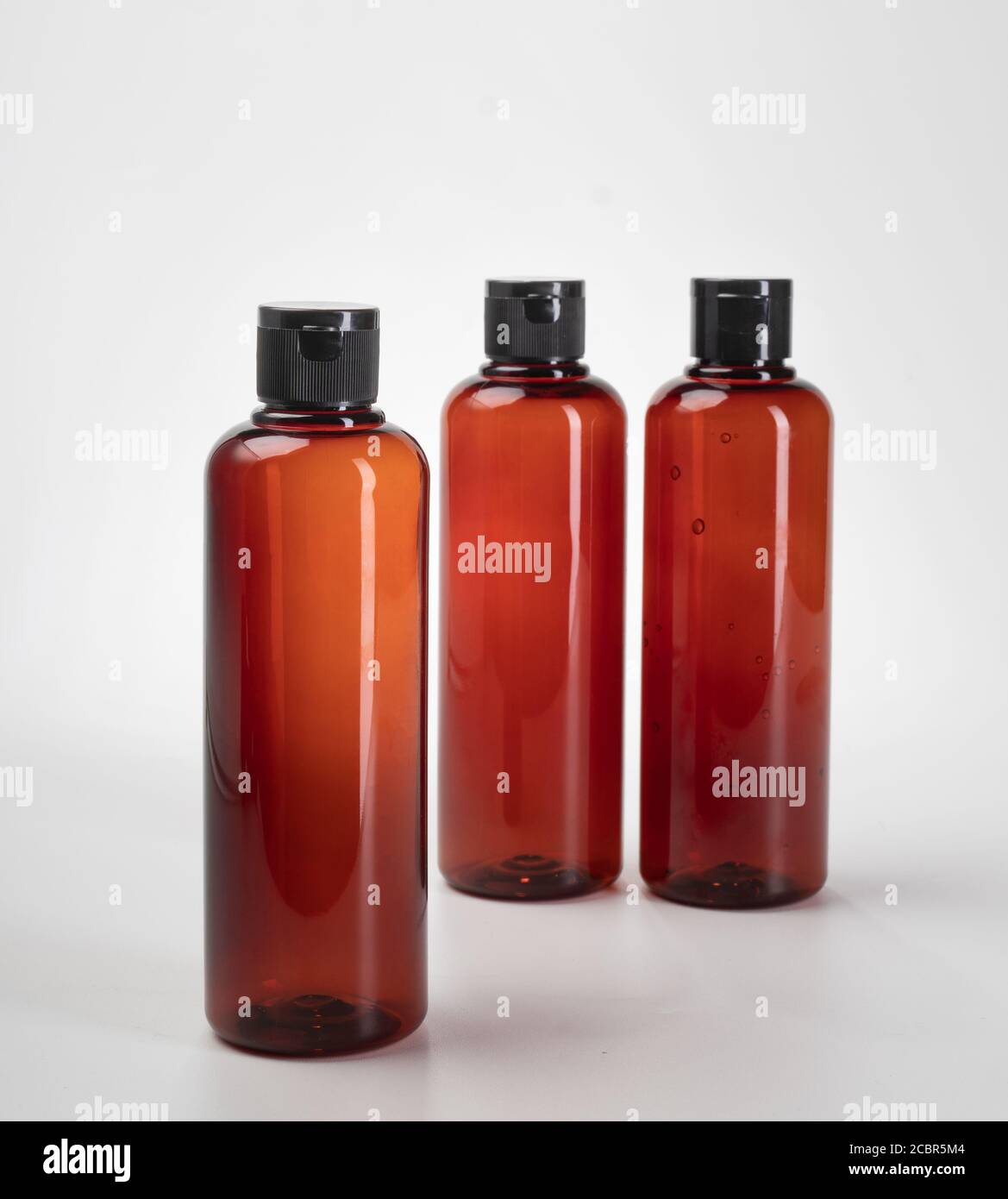 cosmetic plastic bottles, isolated on white background Stock Photo - Alamy