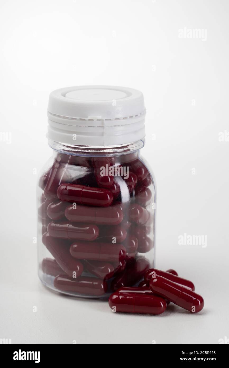 caplets medicine bottle isolated on white background Stock Photo - Alamy